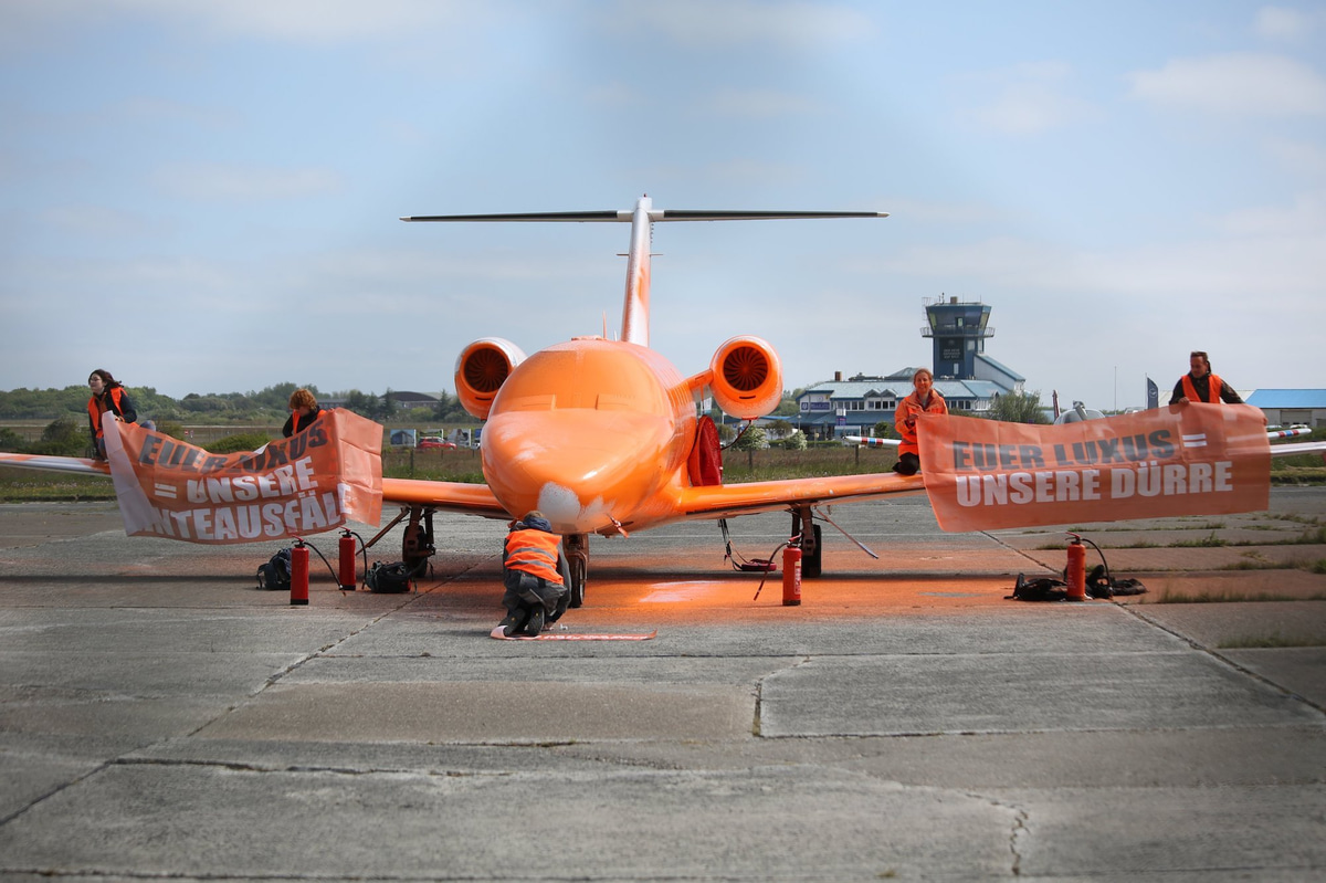 German Eco-protesters Damage Citation Business Jet with Orange Paint ...